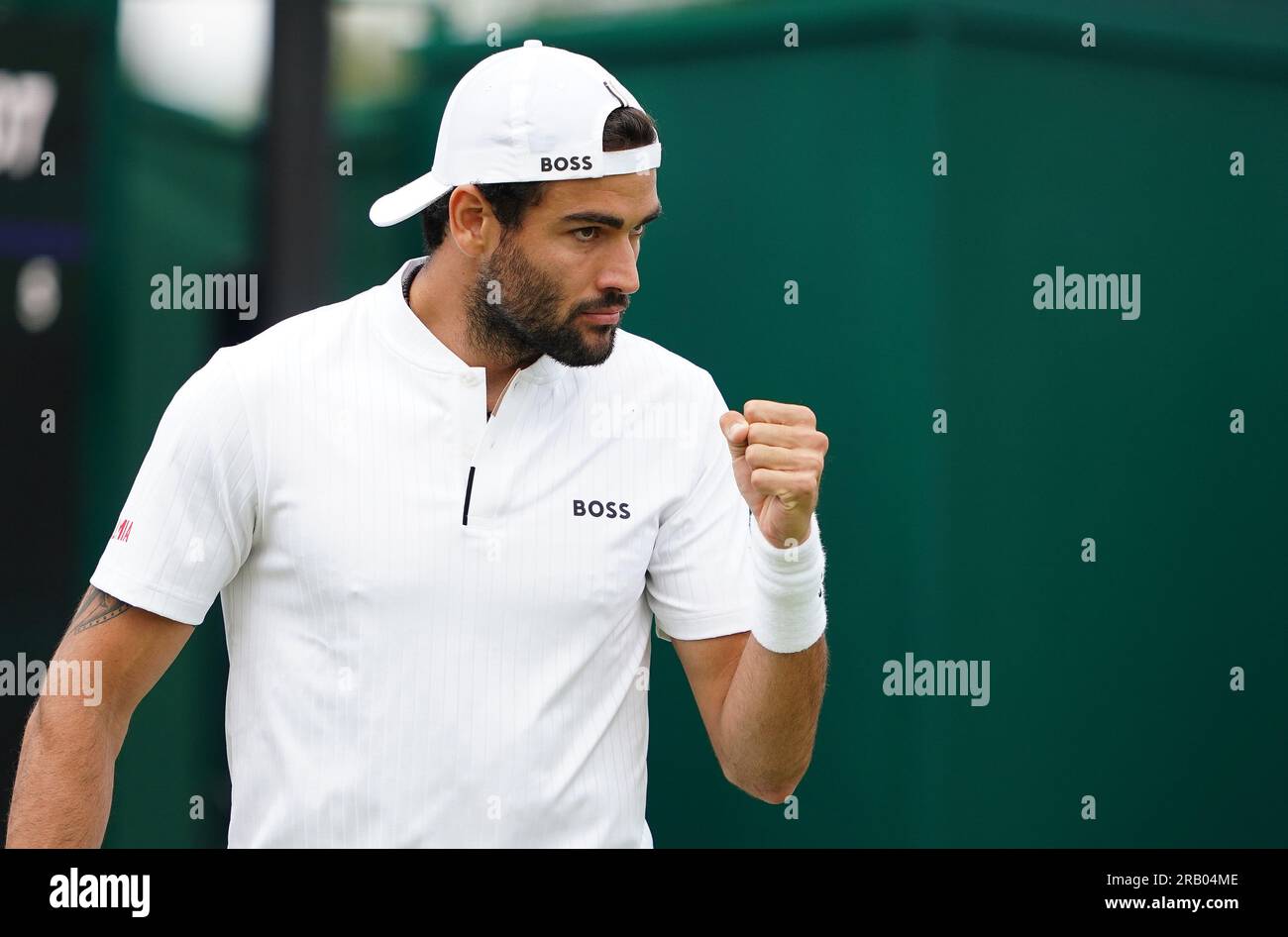 Matteo Berrettini reacts during his match against Lorenzo Sonego (not pictured) on day four of ...
