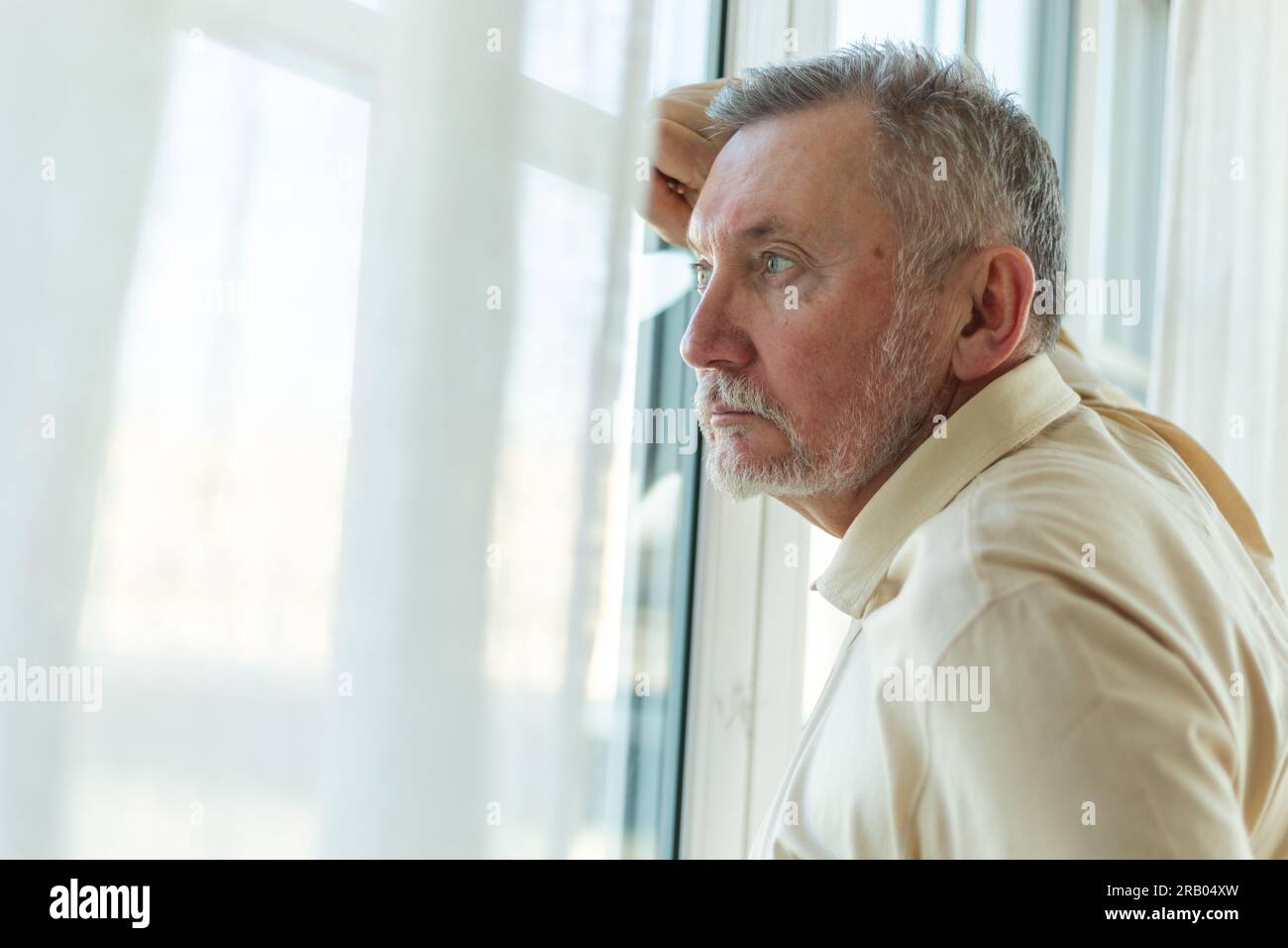 Sad tired lonely disappointed older senior man at home alone. Unhappy ...