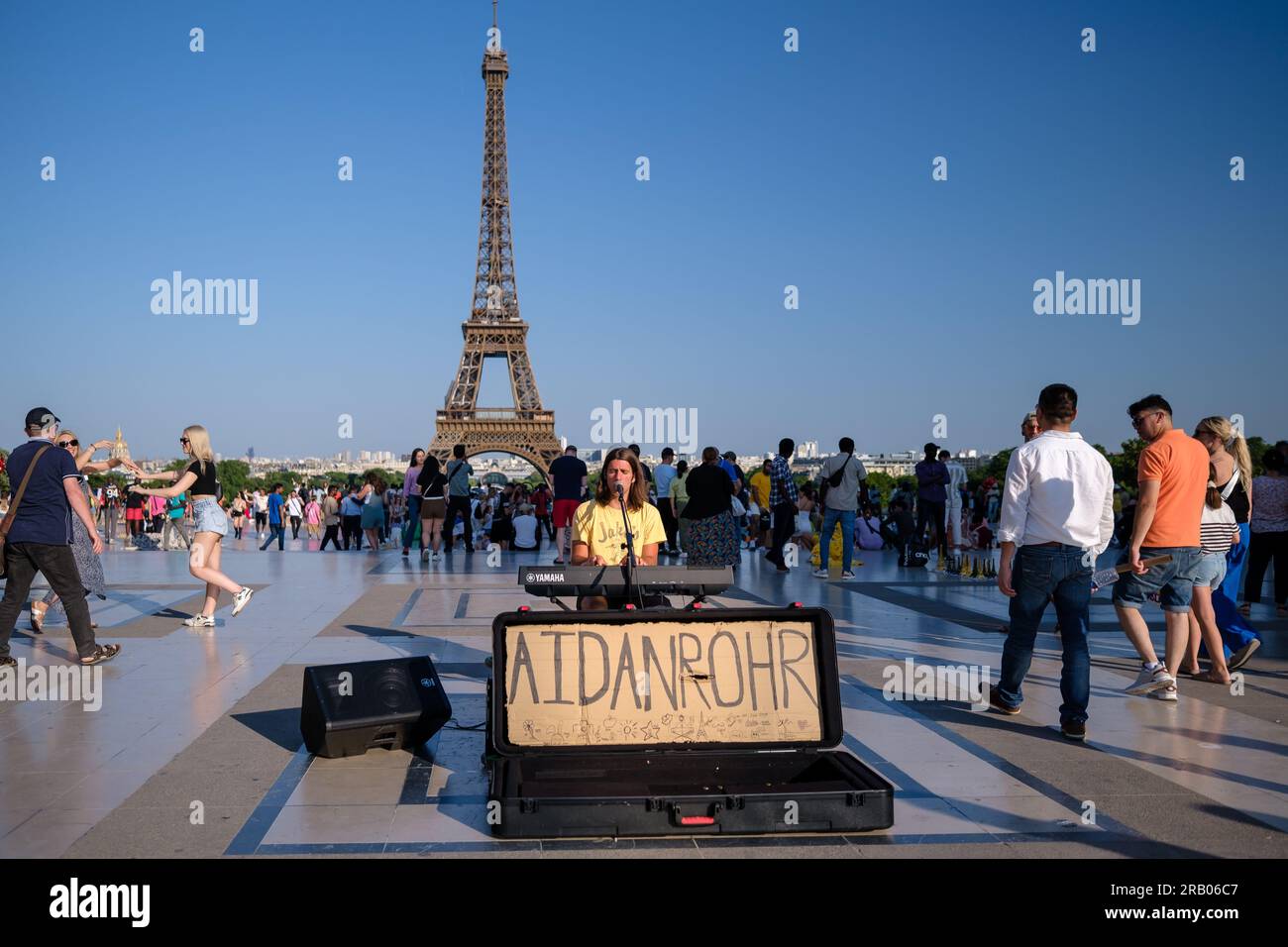 Paris, France - June 25, 2023 : View of a street musician playing music ...