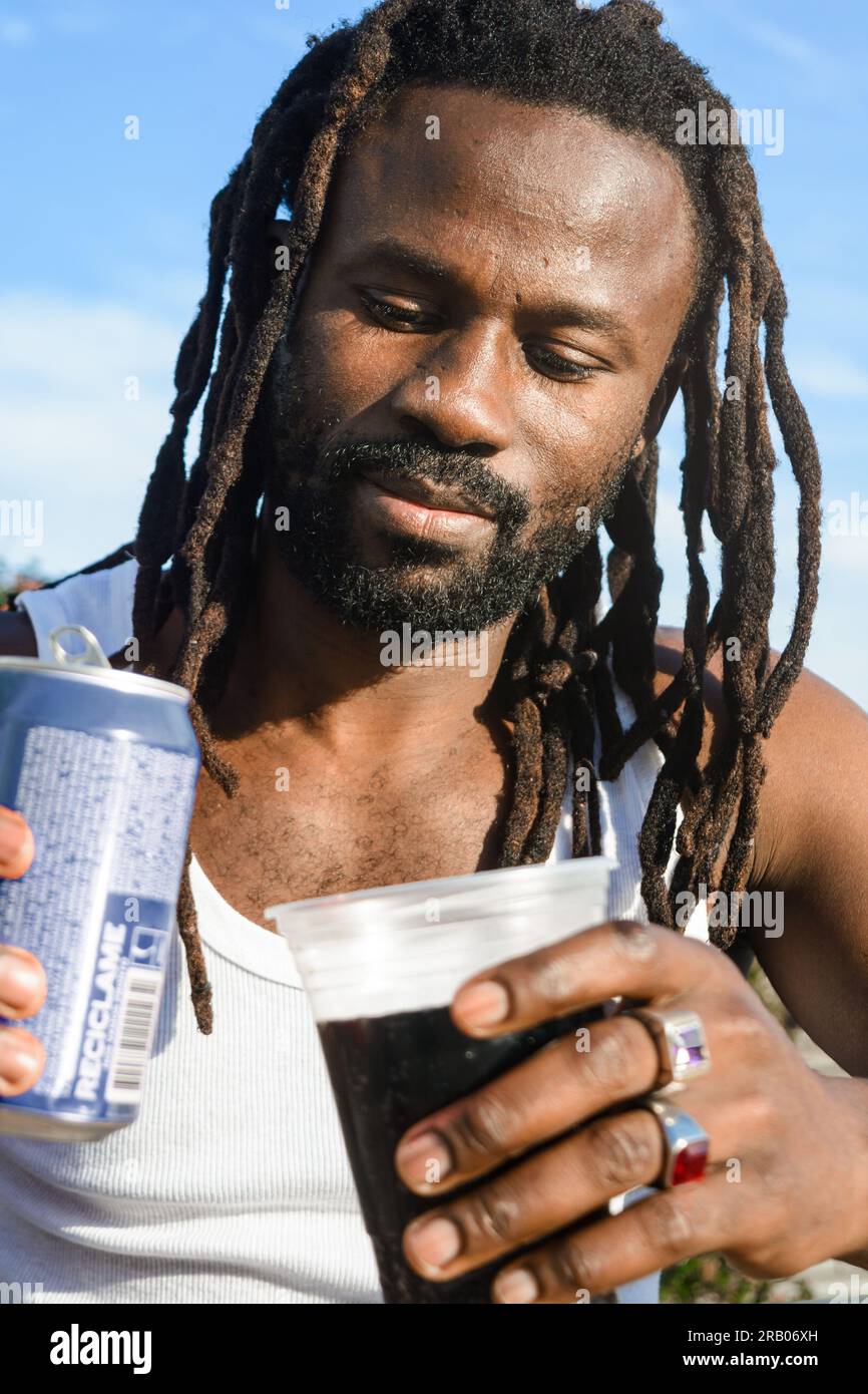 Black man with dreadlocks hi-res stock photography and images - Alamy