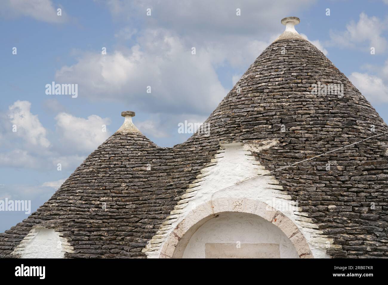 closeup of the roofs of the trulli unique houses in Alberobello, Apulia ...