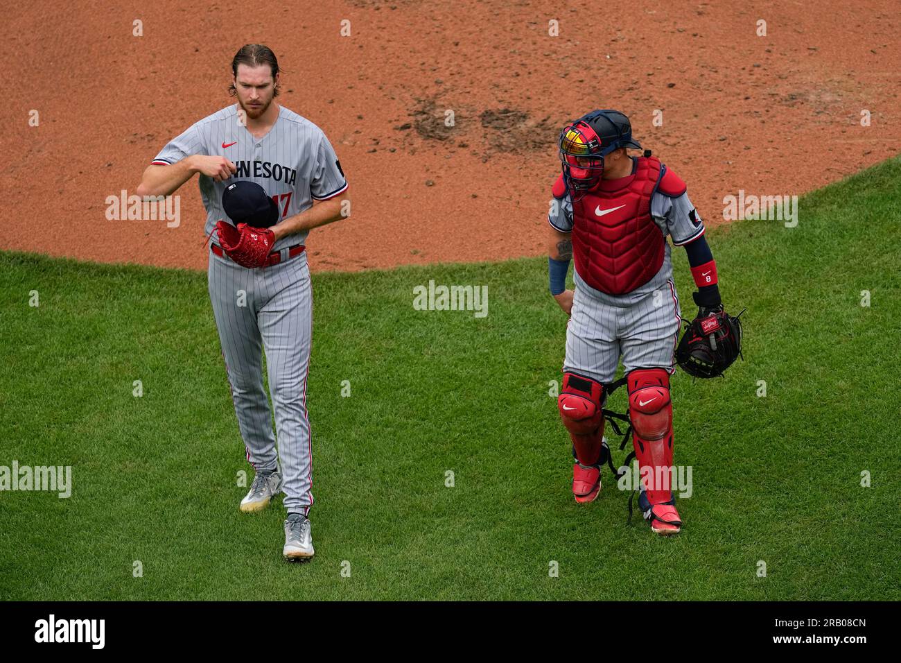 The battery of Minnesota Twins starting pitcher Bailey Ober, left, and ...