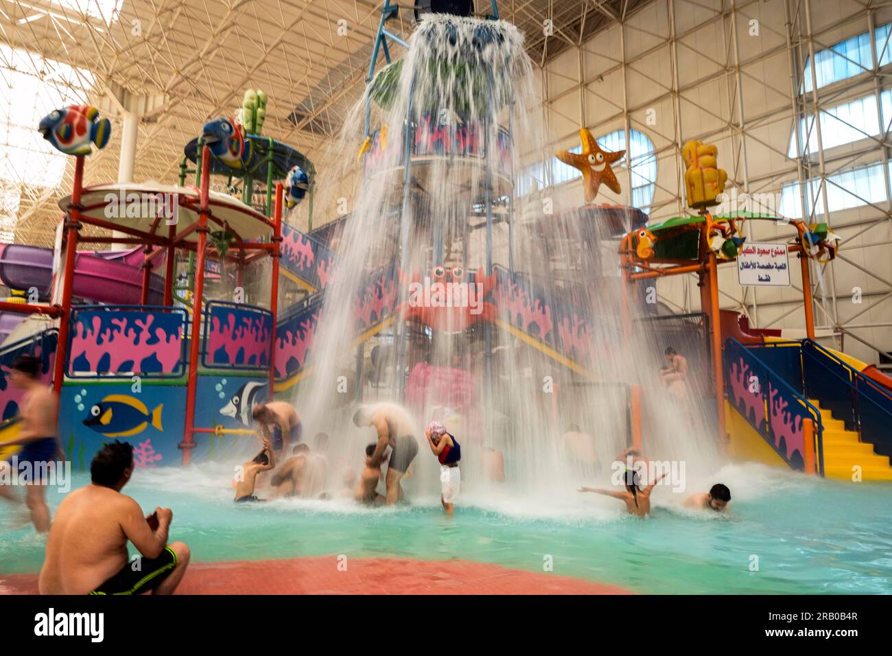 People escape the searing summer heat at Baghdad Aquatic Center in ...