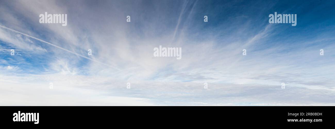 Image of a partly cloudy and partly clear sky during the day without ...