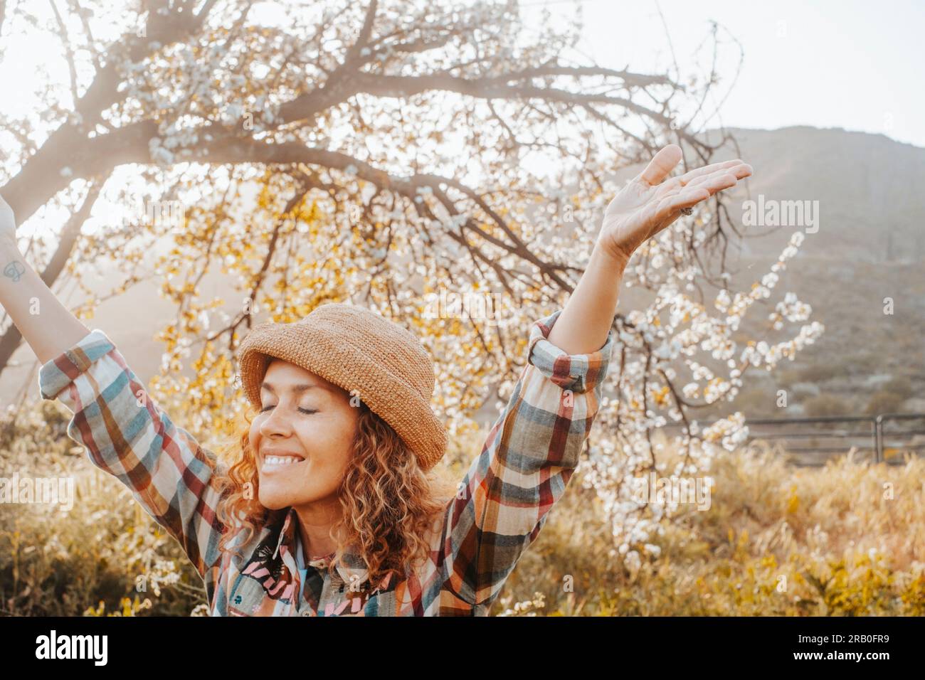 Springtime. Welcome spring concept image with overjoyed happy woman ...