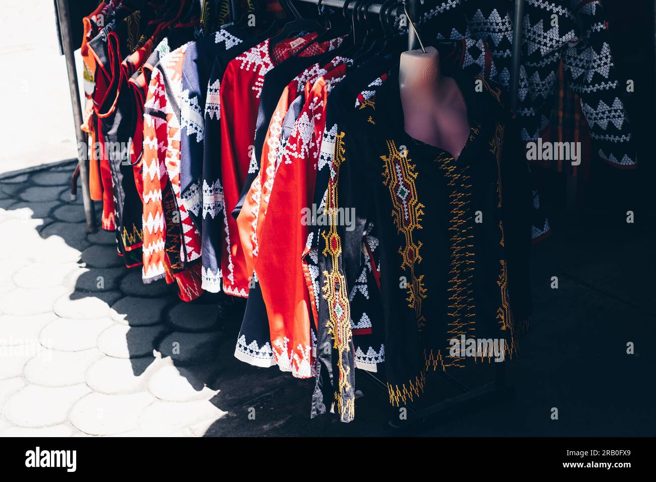 Hanging array of handmade traditional dresses of T'boli women called ...