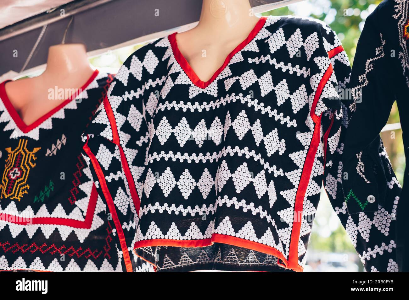 Hanging array of handmade traditional dresses of T'boli women called ...