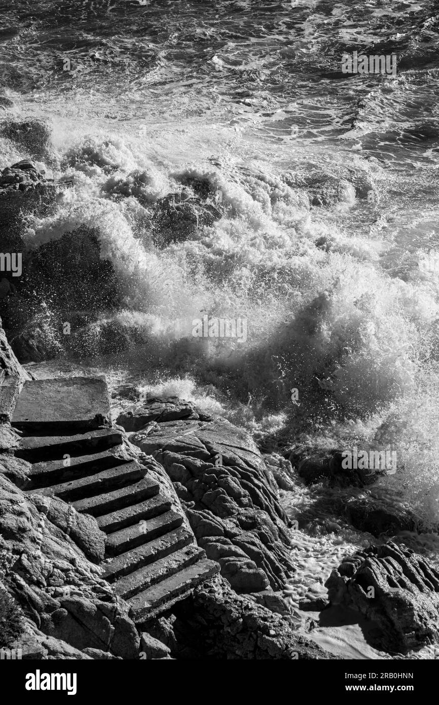 Cliff rocks in sea Black and White Stock Photos & Images - Alamy