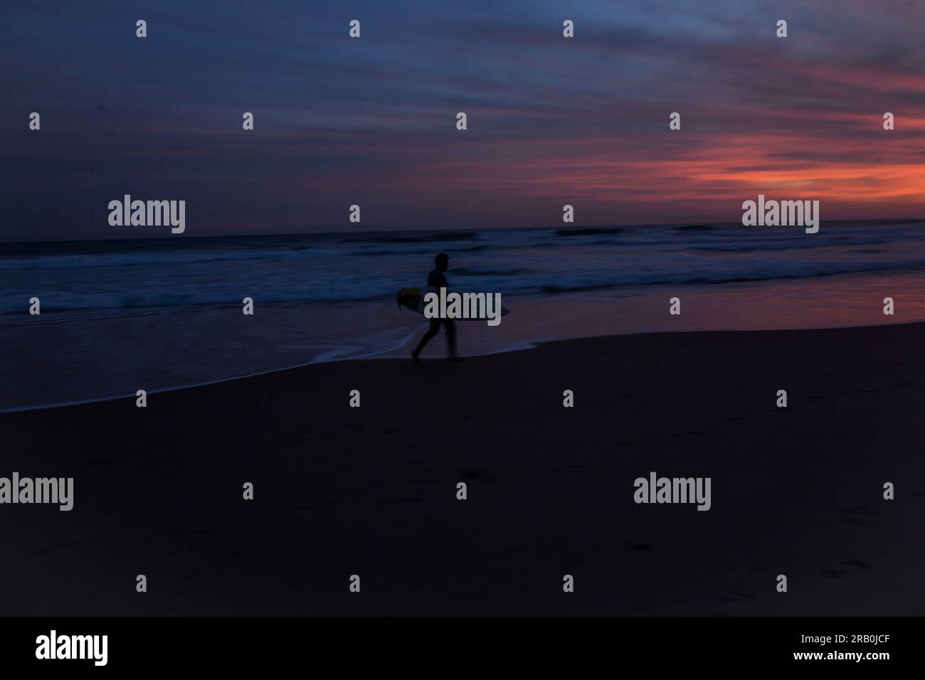 Shot lonely surfer in hi-res stock photography and images - Alamy