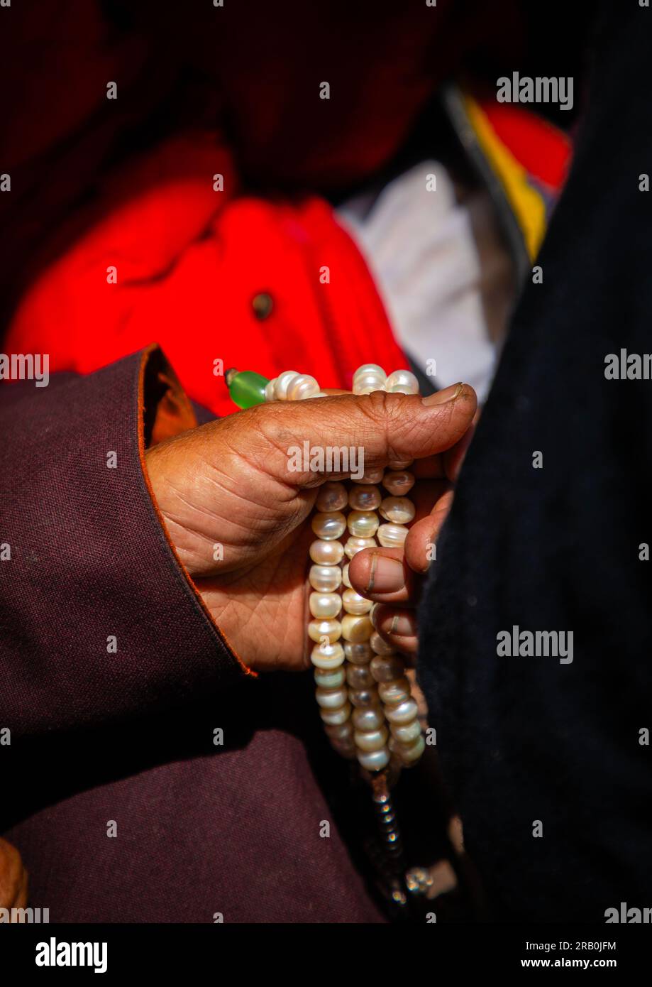 Buddhist hand with a payer beads, Ladakh, Khalatse, India Stock Photo ...