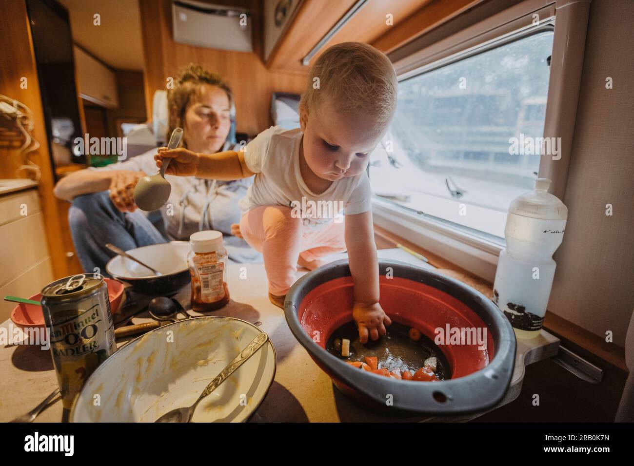 Family having breakfast in camper Stock Photo - Alamy