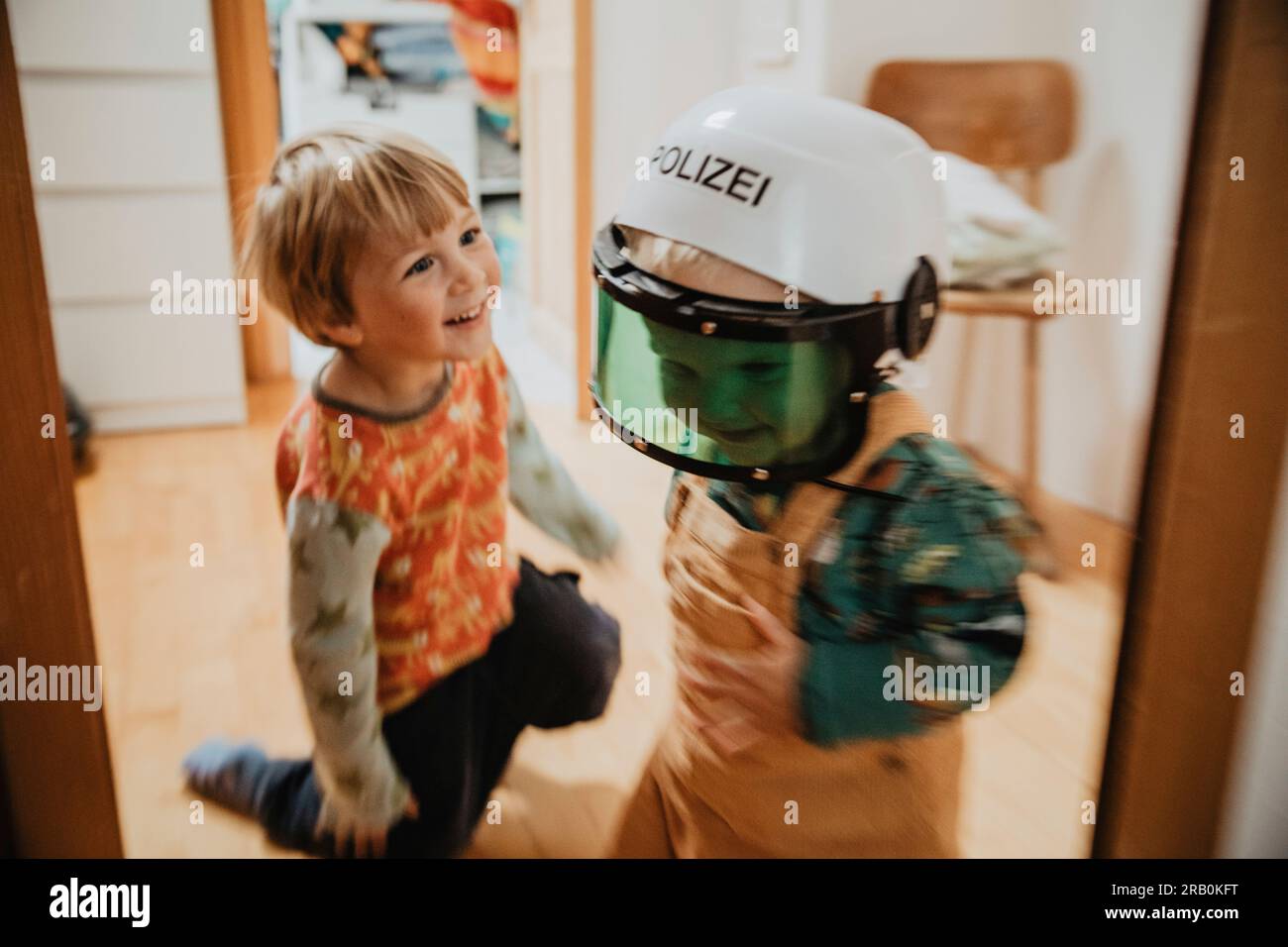 Brother and sister play dress up Stock Photo - Alamy