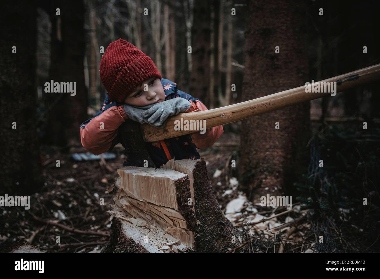 Kid leaning against tree hi-res stock photography and images - Alamy