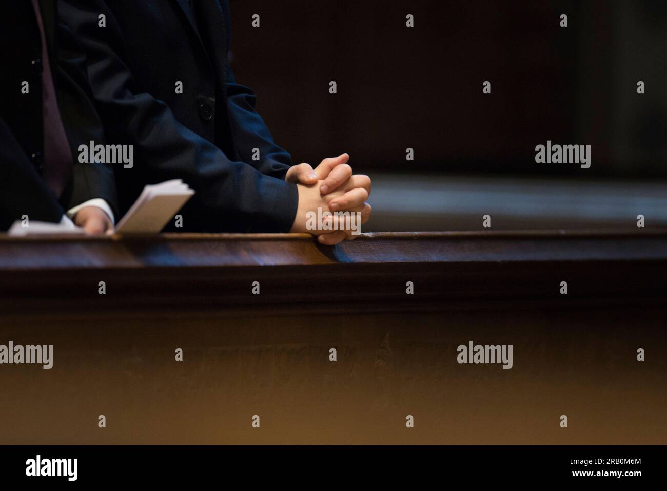 Hand folding for praying Stock Photo - Alamy