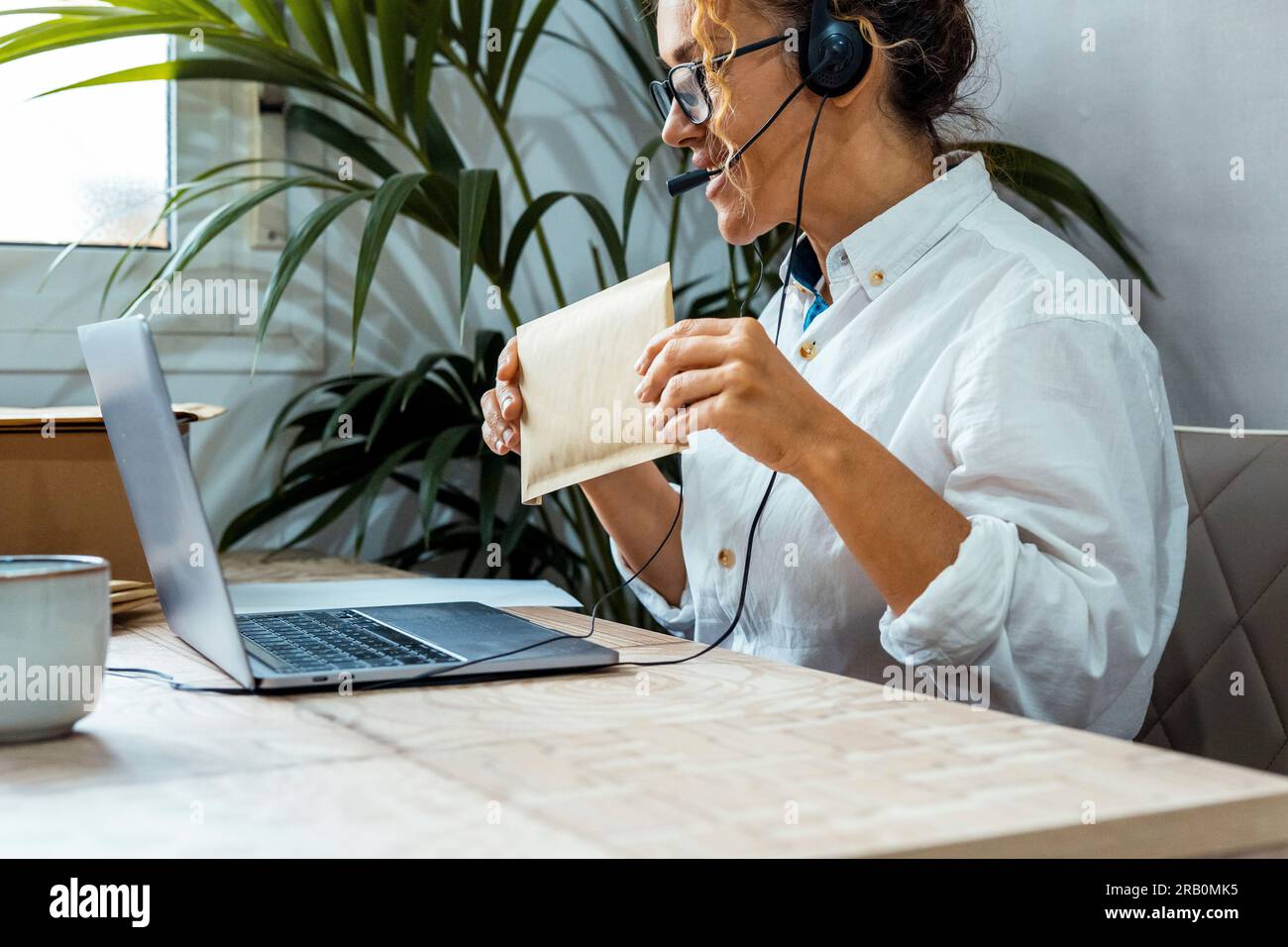 Happy customer service worker using hi-res stock photography and images ...