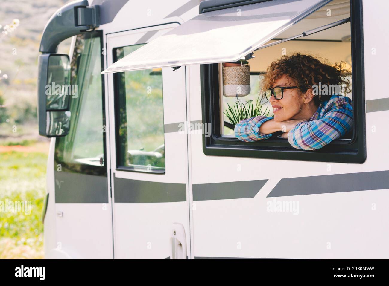 Happy tourist enjoy destination smiling outside the window of modern ...