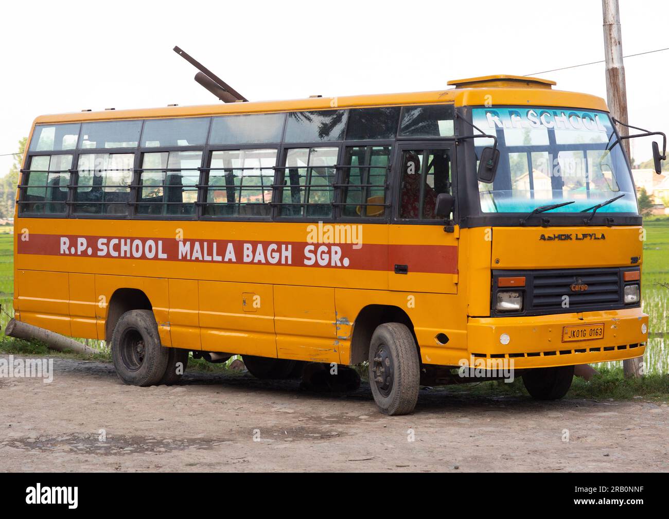 Yellow school bus, Jammu and Kashmir, Ganderbal, India Stock Photo - Alamy