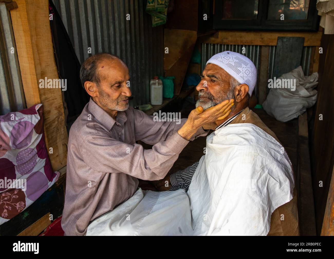 Kashmiri man having beard shaved off, Jammu and Kashmir, Charar- E ...