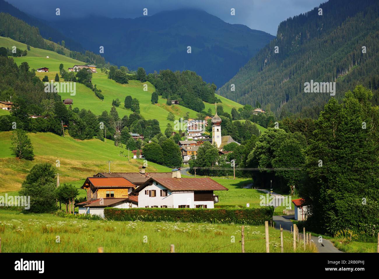 Mountain village on the mountainside. Village in mountains Stock Photo ...