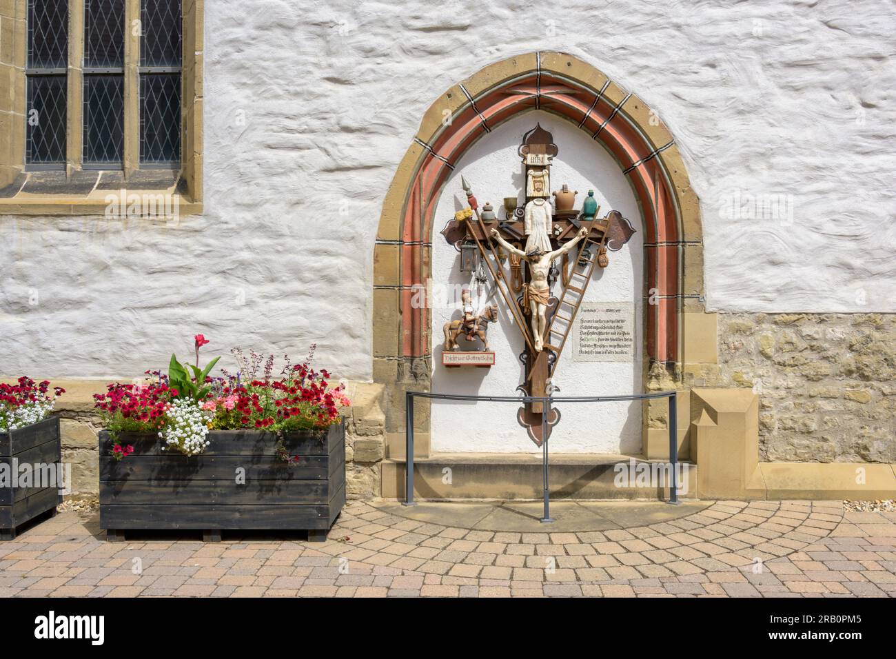 Cross on the outer facade of the catholic church hi-res stock ...