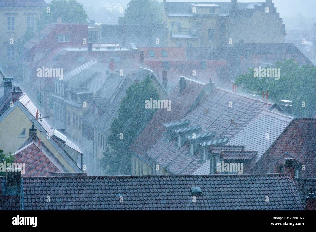 Heavy rain in the city Stock Photo - Alamy