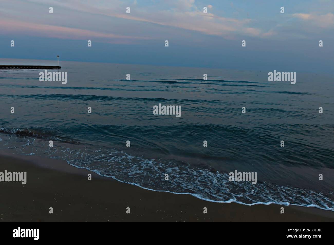View of Lido di Jesolo beach in the early evening at sunset, Italy ...