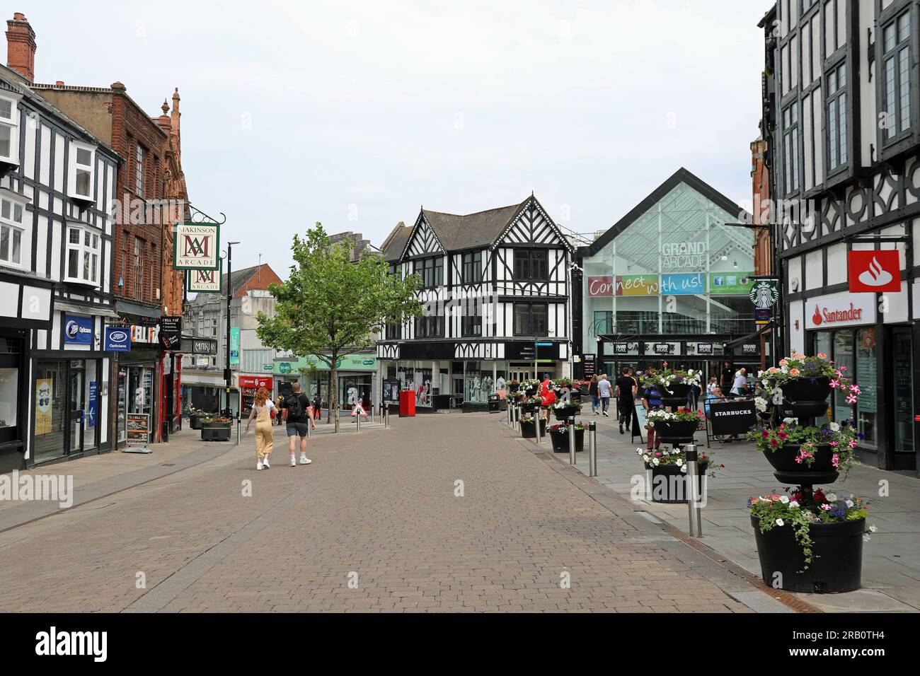 Town centre shoppers at Wigan in Greater Manchester Stock Photo - Alamy