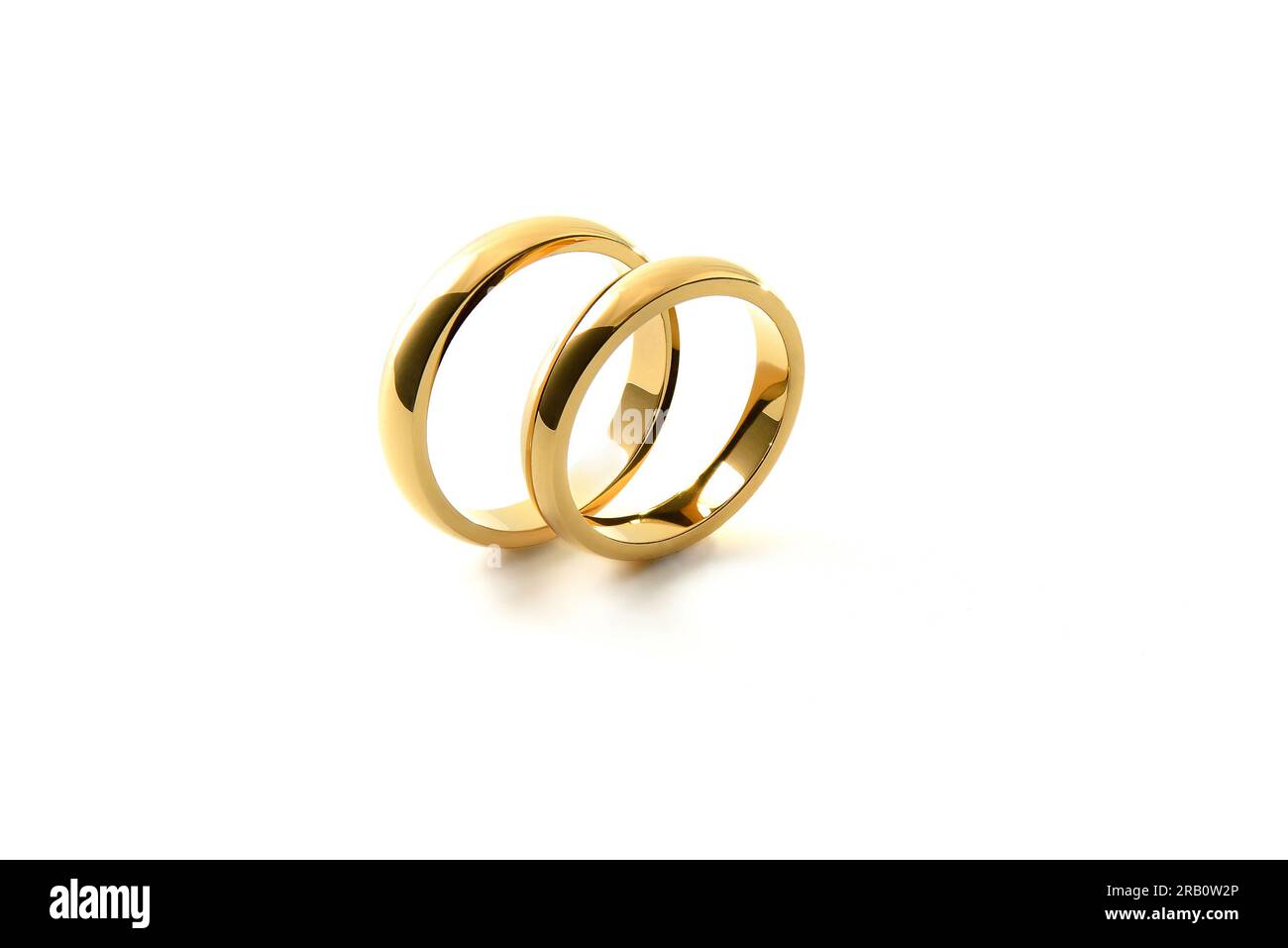 Detail of engagement gold rings standing parallel next to each other ...