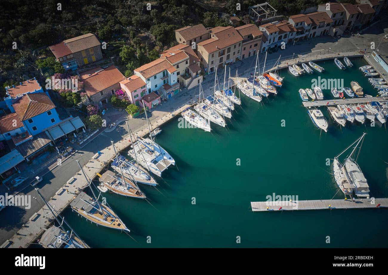 Sailboats in Capraia town harbor, Capraia island, Tuscany, Italy Stock ...