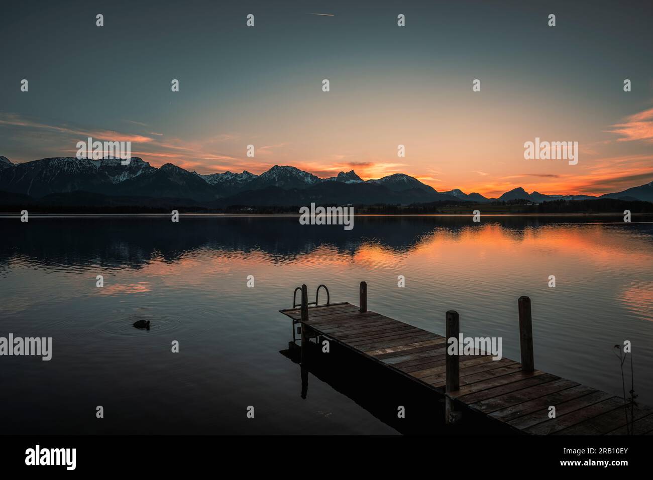 Lake, jetty, mountains, sunset, bavaria, germany, hopfensee Stock Photo ...