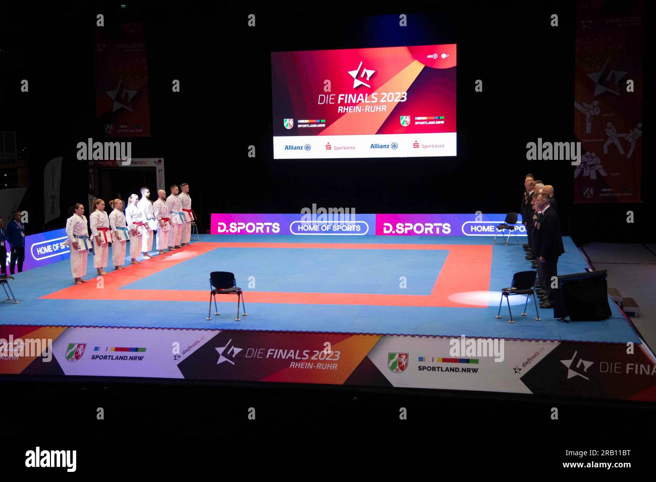 The karateka and judges at the welcome, feature, marginal motifs ...