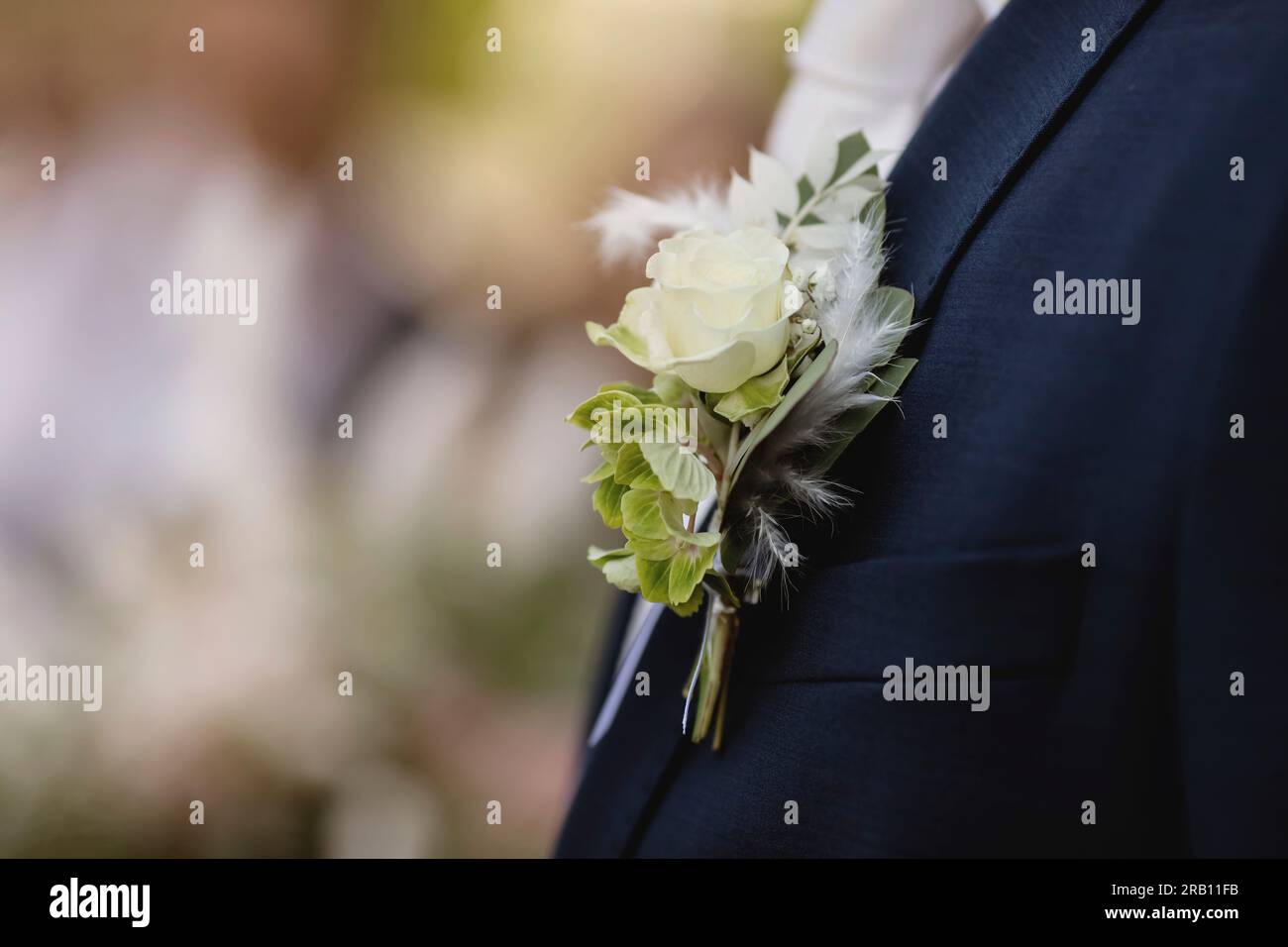 Flower pin for groom with white rose, white feather and green hydrangea ...