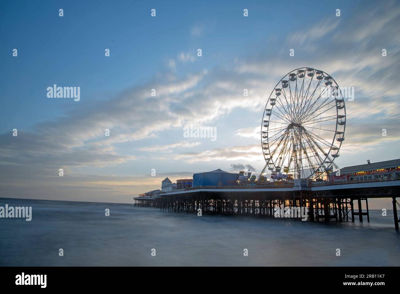 Blackpool Central Pier with the Big Wheel, and high tide Stock Photo ...