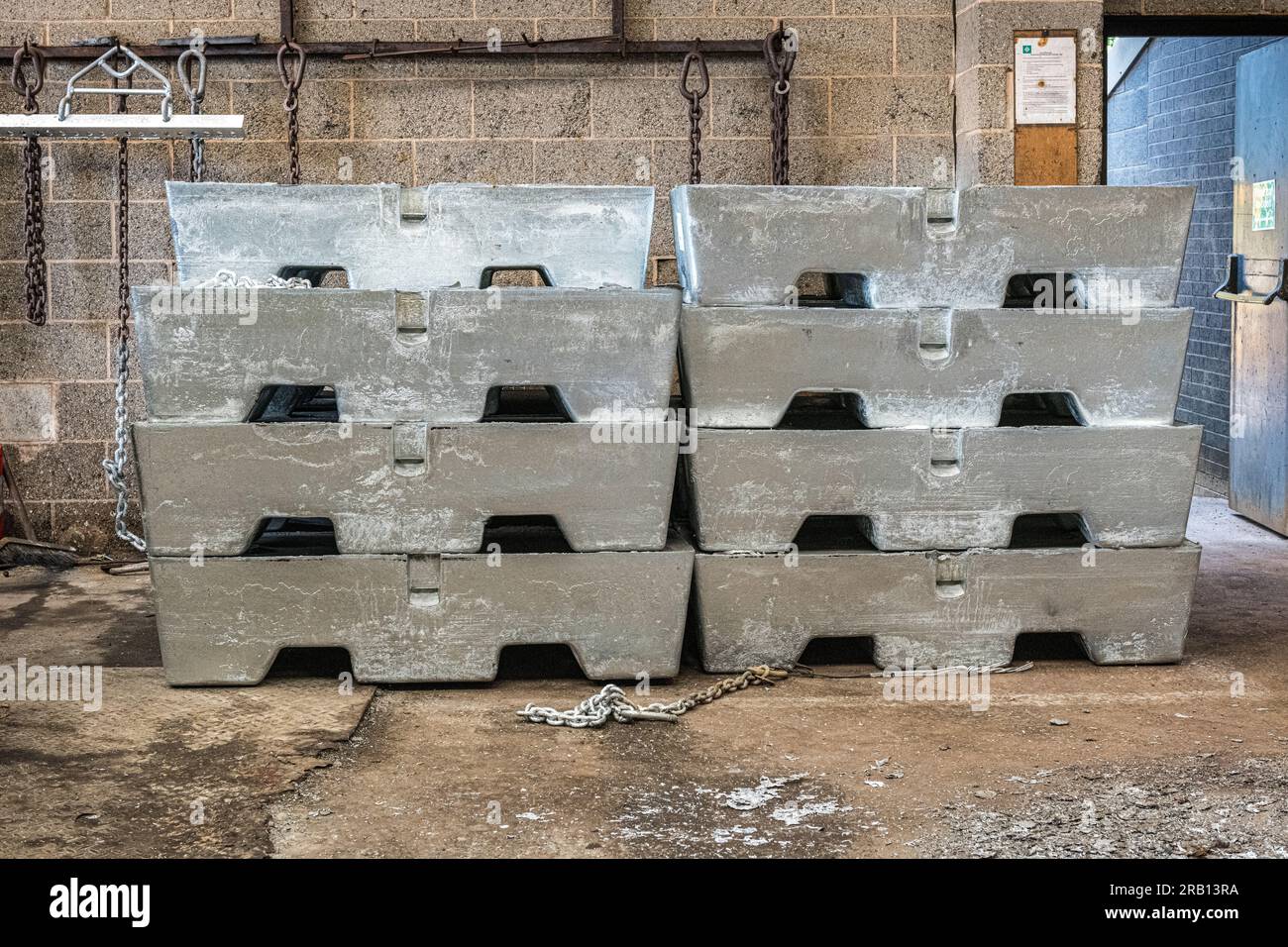 A stack of large zinc ingots in a hot dip galvanising plant, UK. Steel ...