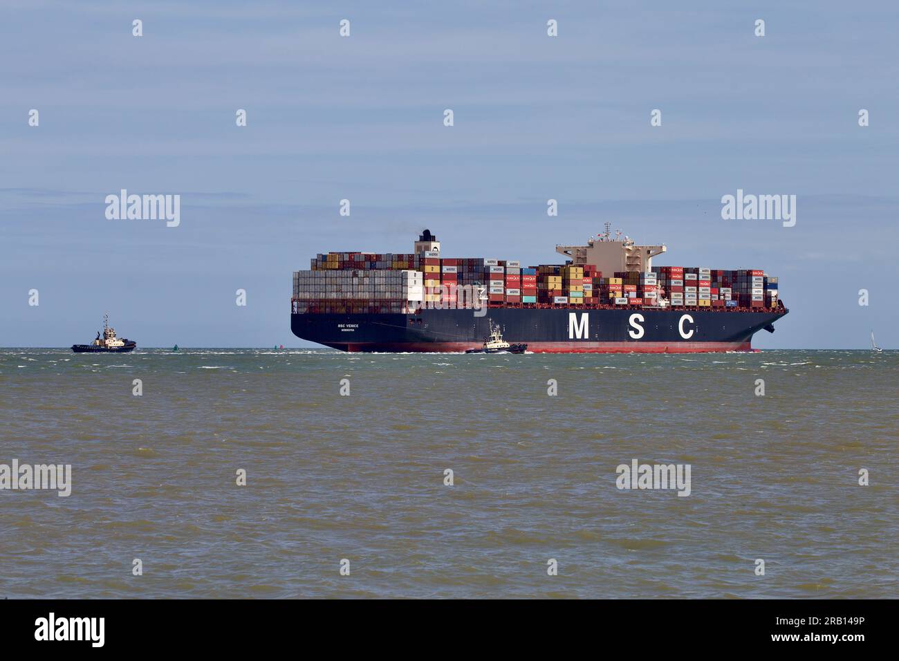 Container ship MSC Venice assisted by tugboats Svitzer Shotley and ...