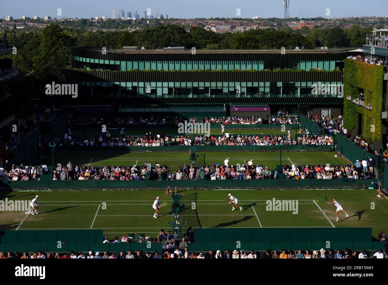 A general view of the action across the outside courts on day four of ...