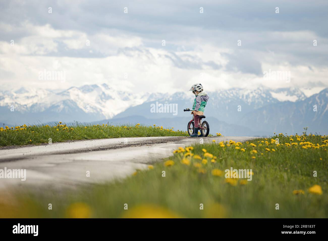 Little girl with running wheel Stock Photo - Alamy Little girl with running wheel Stock Photo - Alamy