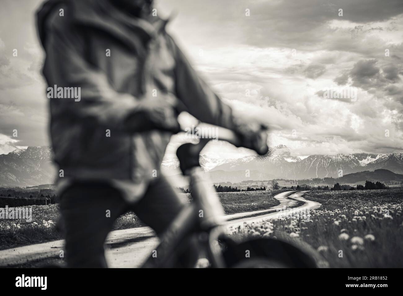 Little girl with the running wheel Stock Photo - Alamy