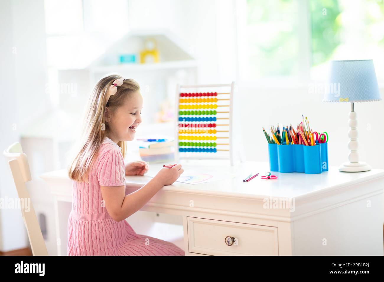 Child doing homework at home. Little kid with wooden colorful abacus ...