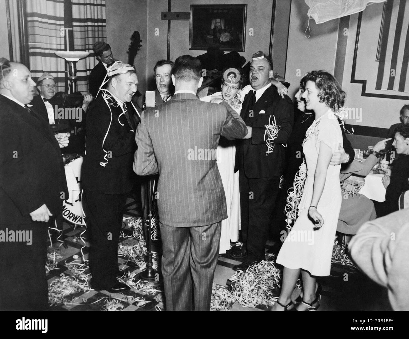United States: January 1, 1948 A group of people at a New Year's Eve ...