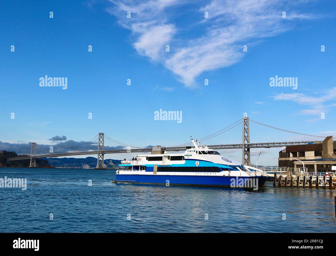 Intintoli ferry boat public transit passenger ferry service arriving to ...