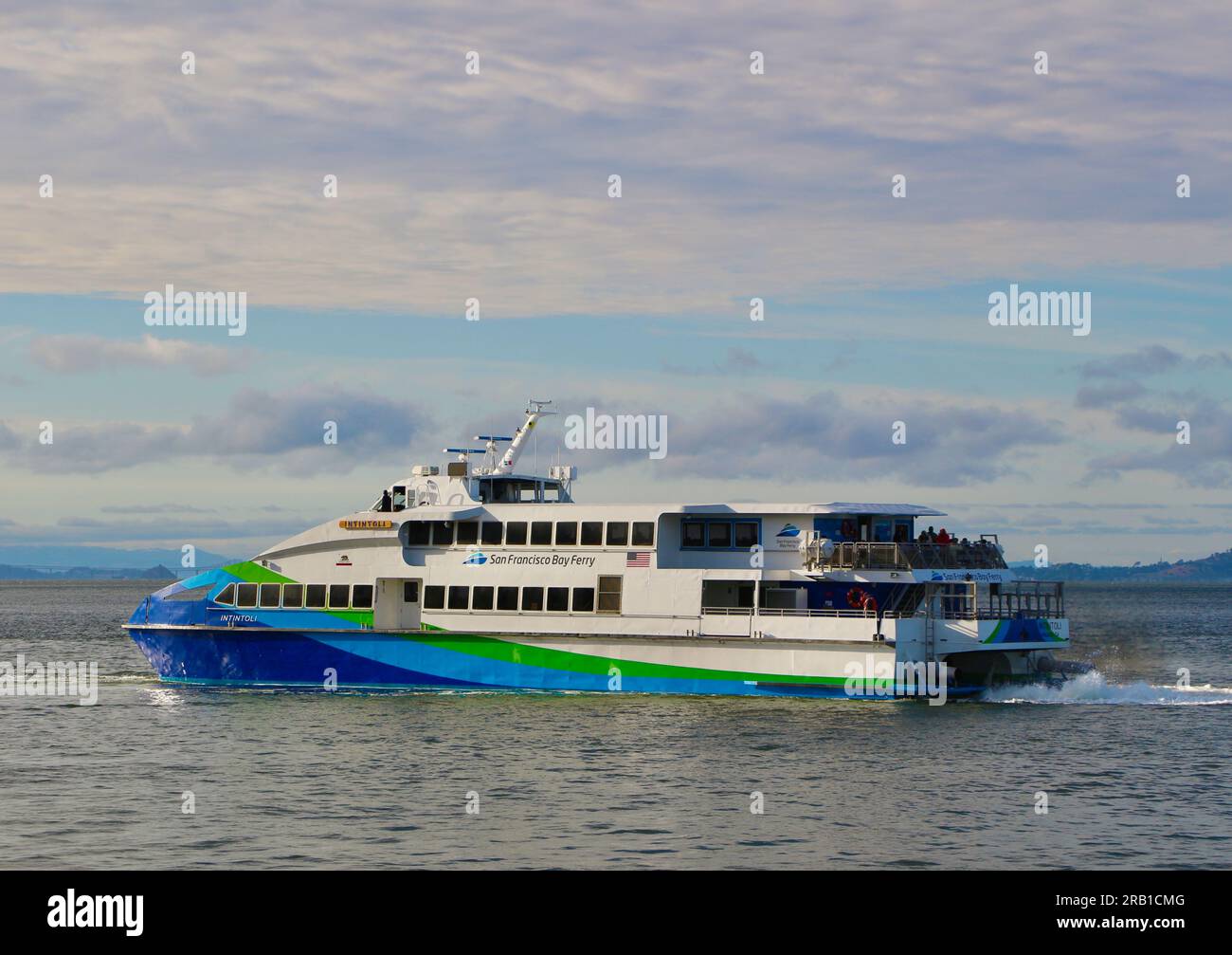 Intintoli ferry boat public transit passenger ferry service leaving the ...