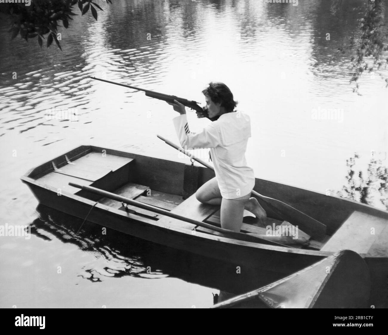 1950s rowboat in lake Black and White Stock Photos & Images - Alamy