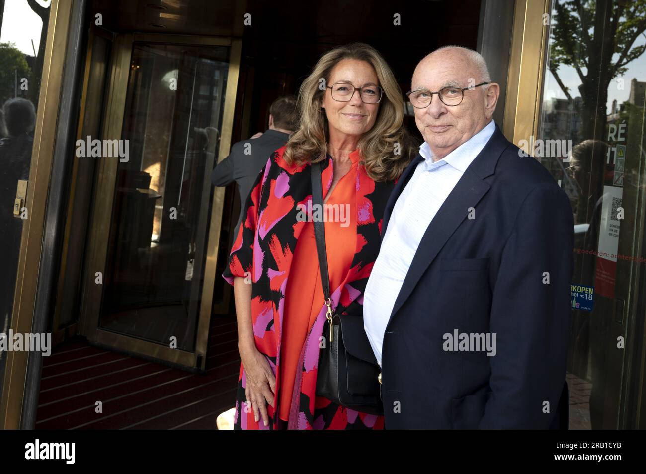AMSTERDAM - Michael van Praag and his wife at the entrance of Carré ...