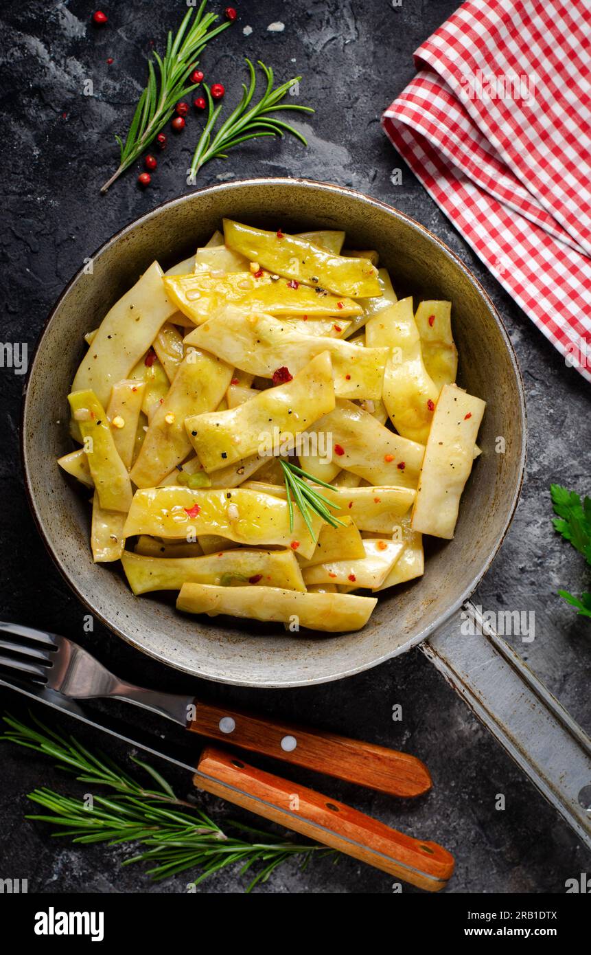 Cooked Yellow Beans, Long Beans in a Skiller over Dark Background ...