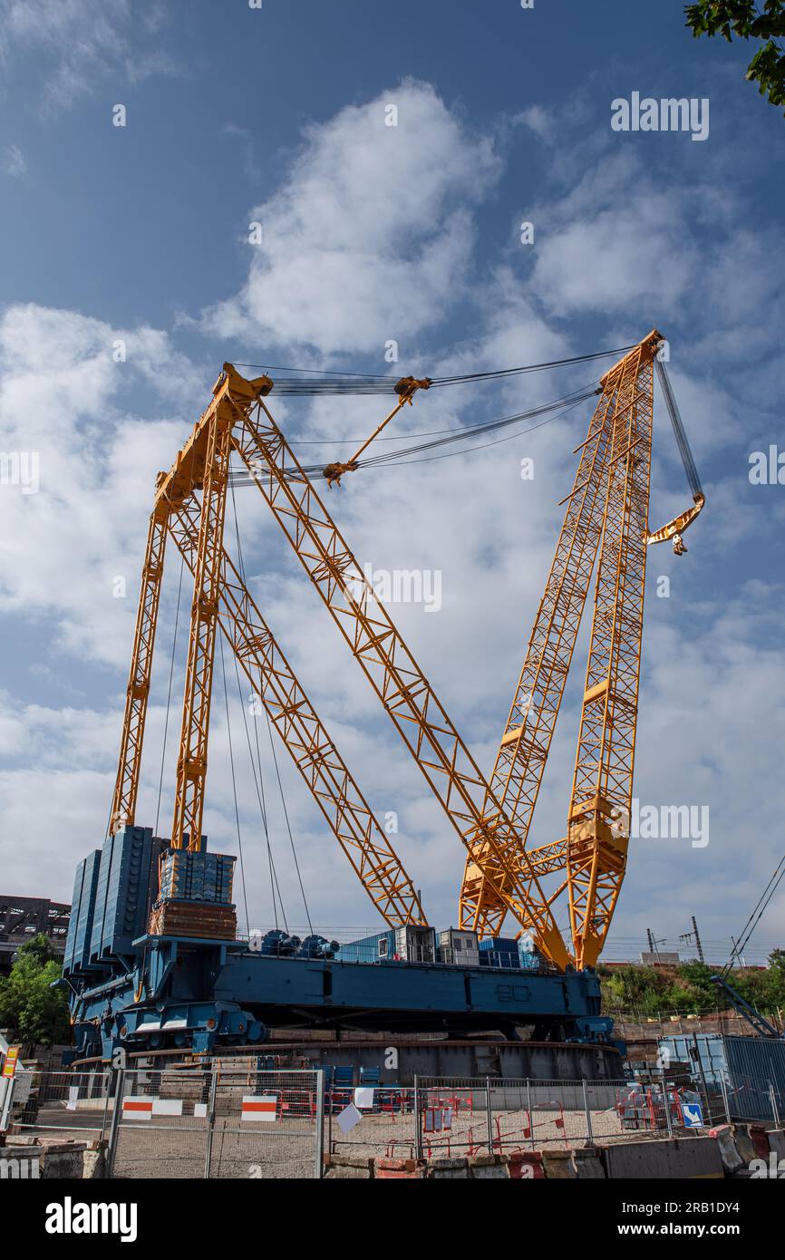 Giant crane on an urban construction site Stock Photo - Alamy