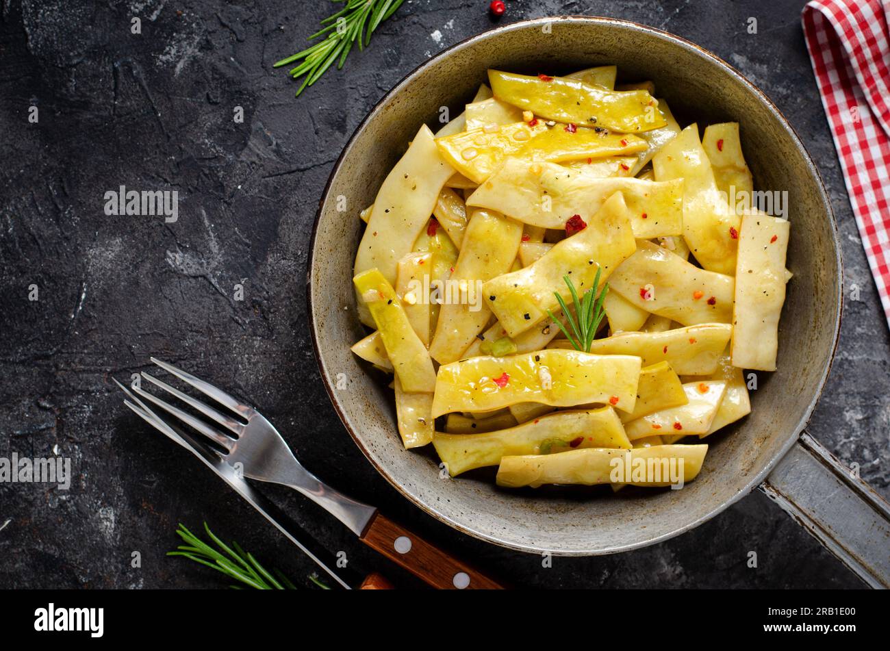 Cooked Yellow Beans, Long Beans in a Skiller over Dark Background ...