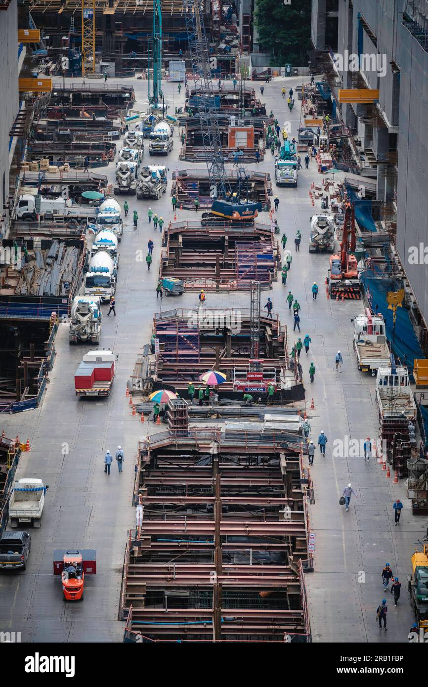 July 5, 2023, Bangkok, Thailand: Construction workers are seen working on the site of 11 Cloud ...
