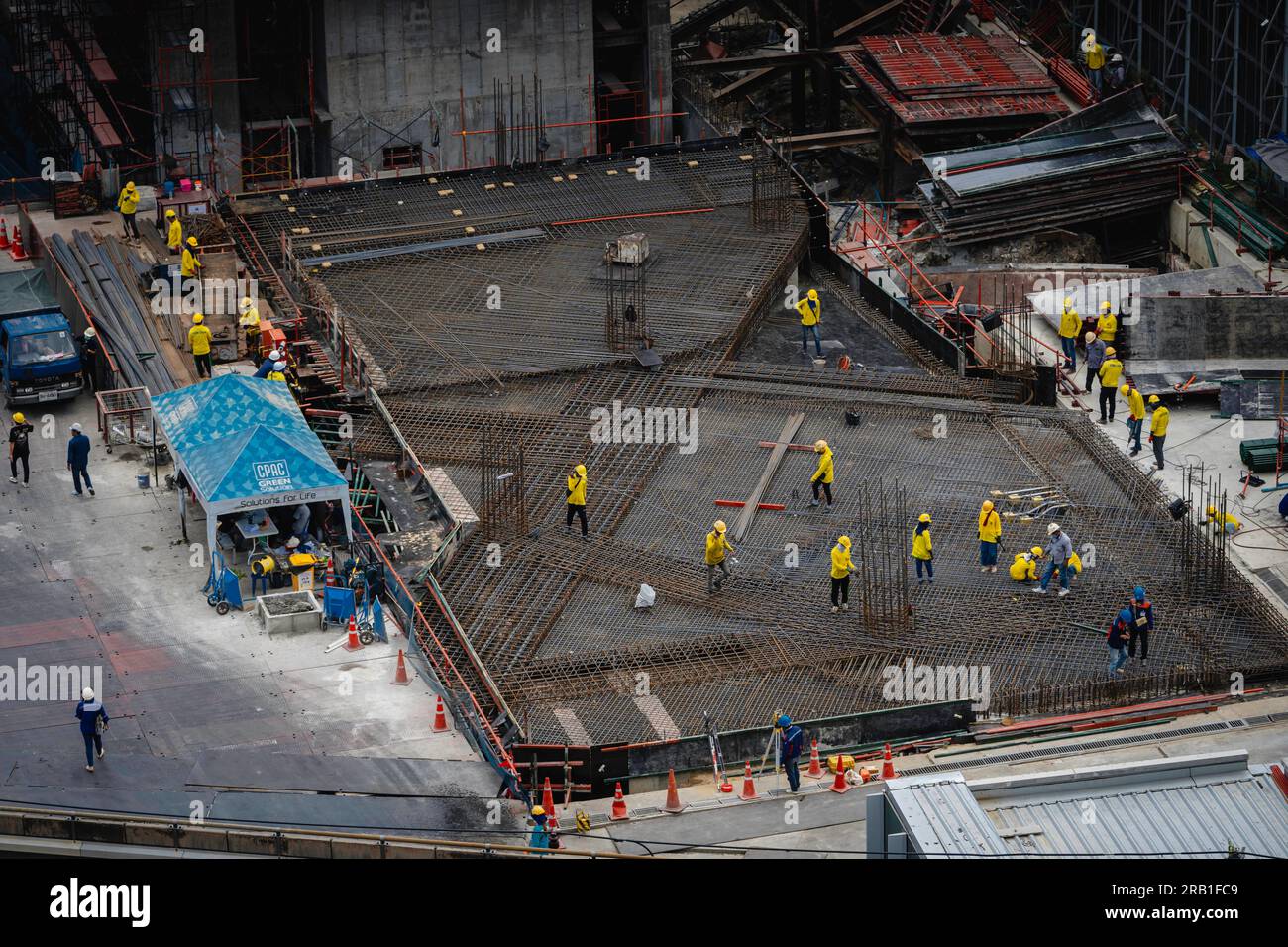 July 5, 2023, Bangkok, Thailand: Construction workers are seen setting metal meshes at Cloud 11 ...