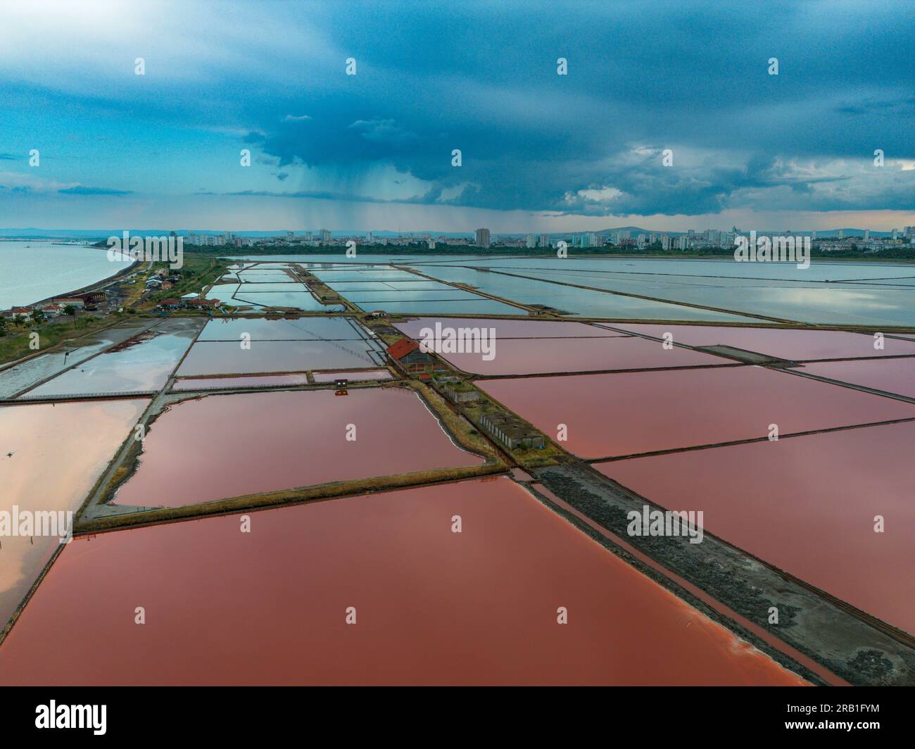 Salt farm excavator top view with salt hill Stock Photo - Alamy